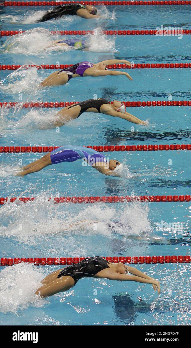 Competitors start a Women's 200m backstroke heat at the Asian Games in ...