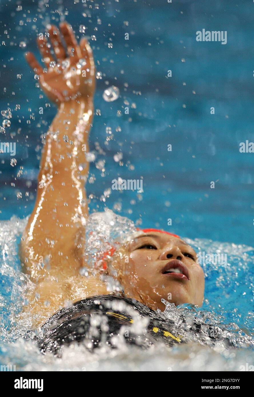 China's Qi Hui competes in a Women's 400m individual medley heat at the ...