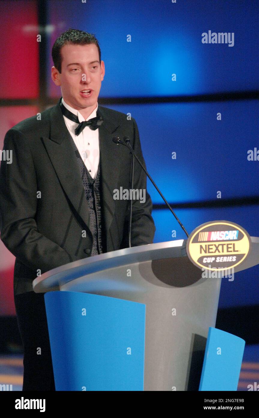 Kyle Busch speaks after accepting his award for finishing tenth in the ...