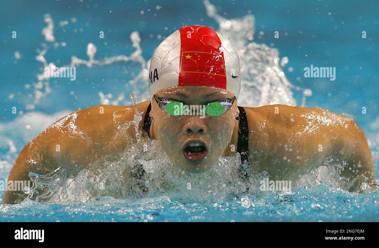 China's Xu Yanwei competes in a Women's 100m butterfly heat at the ...