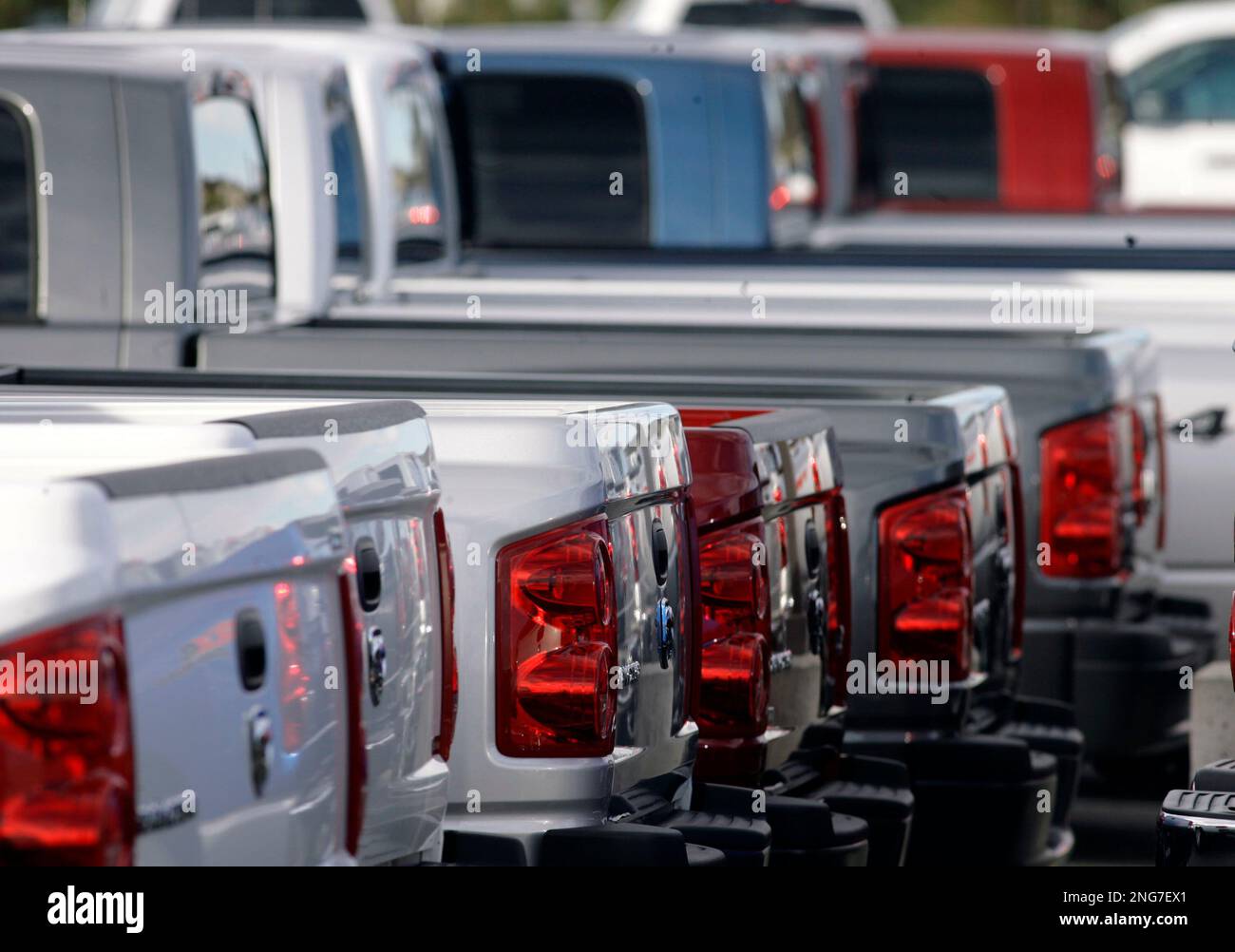Unsold 2006 Dakota pickup turcks sit on the back lot of a Dodge ...