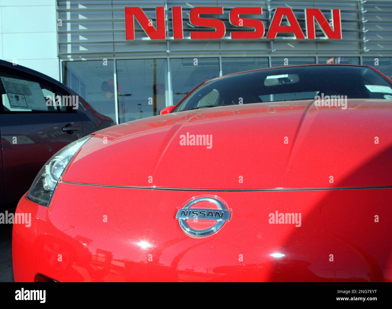 The company logo shines off the nose of an unsold 2006 350z sports car ...