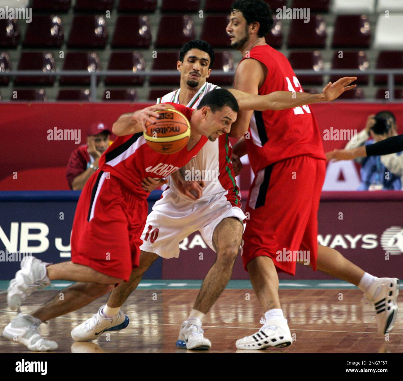 Jordan's Wesam Alsous, left, tries to dribble before Iran's Hamed ...