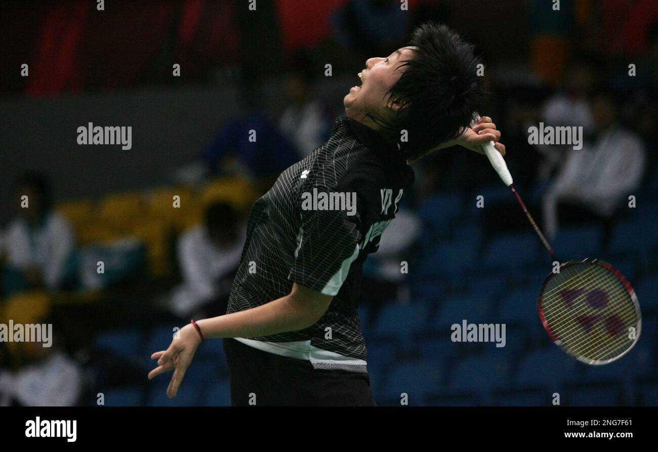 Yip Pui Yin in of Hong Kong rises up to smash while playing against ...