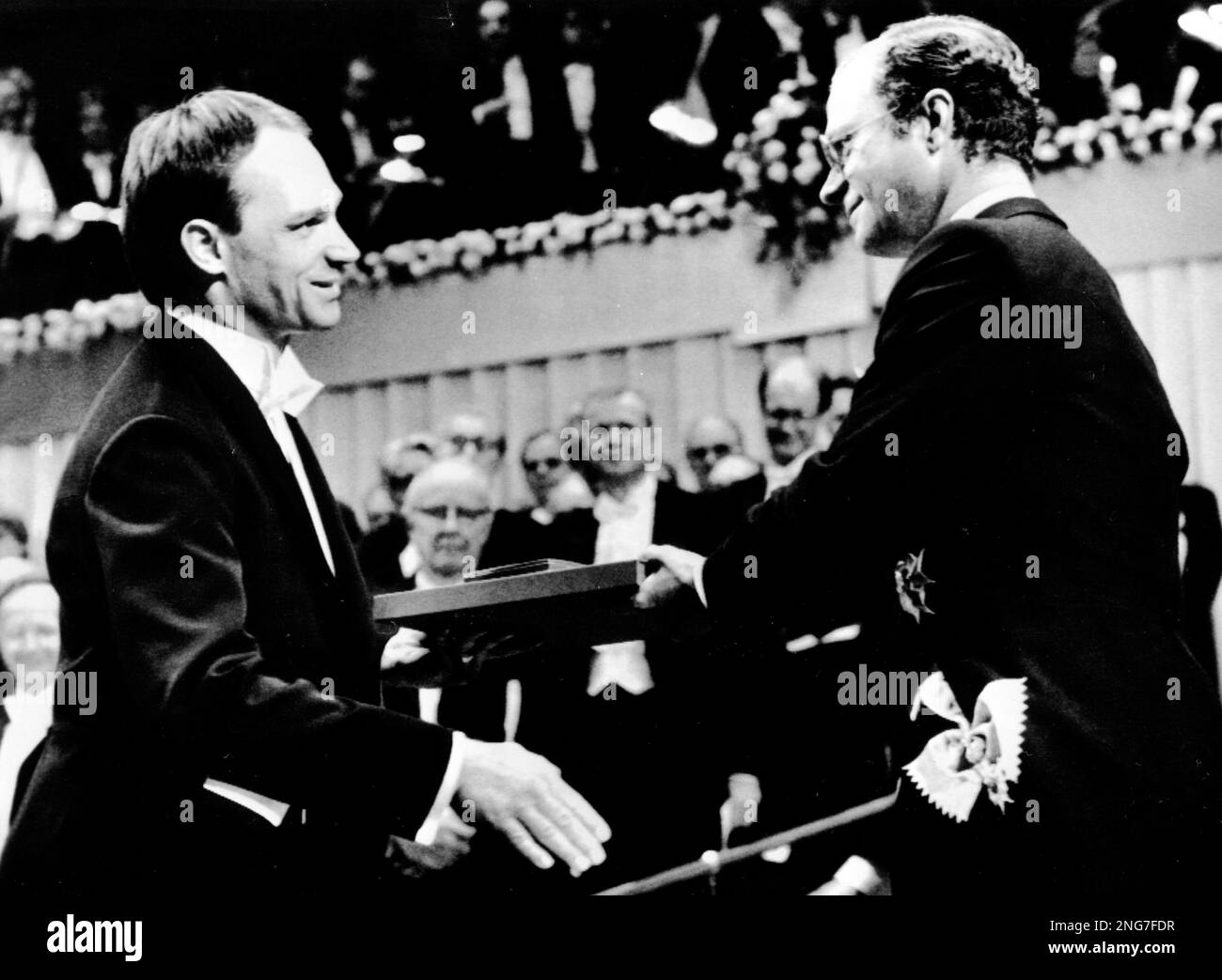 39-year-old physicist Gerd Binnig, from Frankfurt, West Germany, left ...