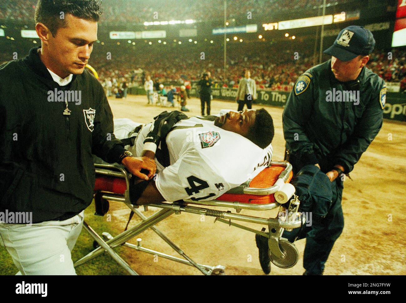 Los Angeles Raiders running back Napoleon McCallum gets carried off the ...