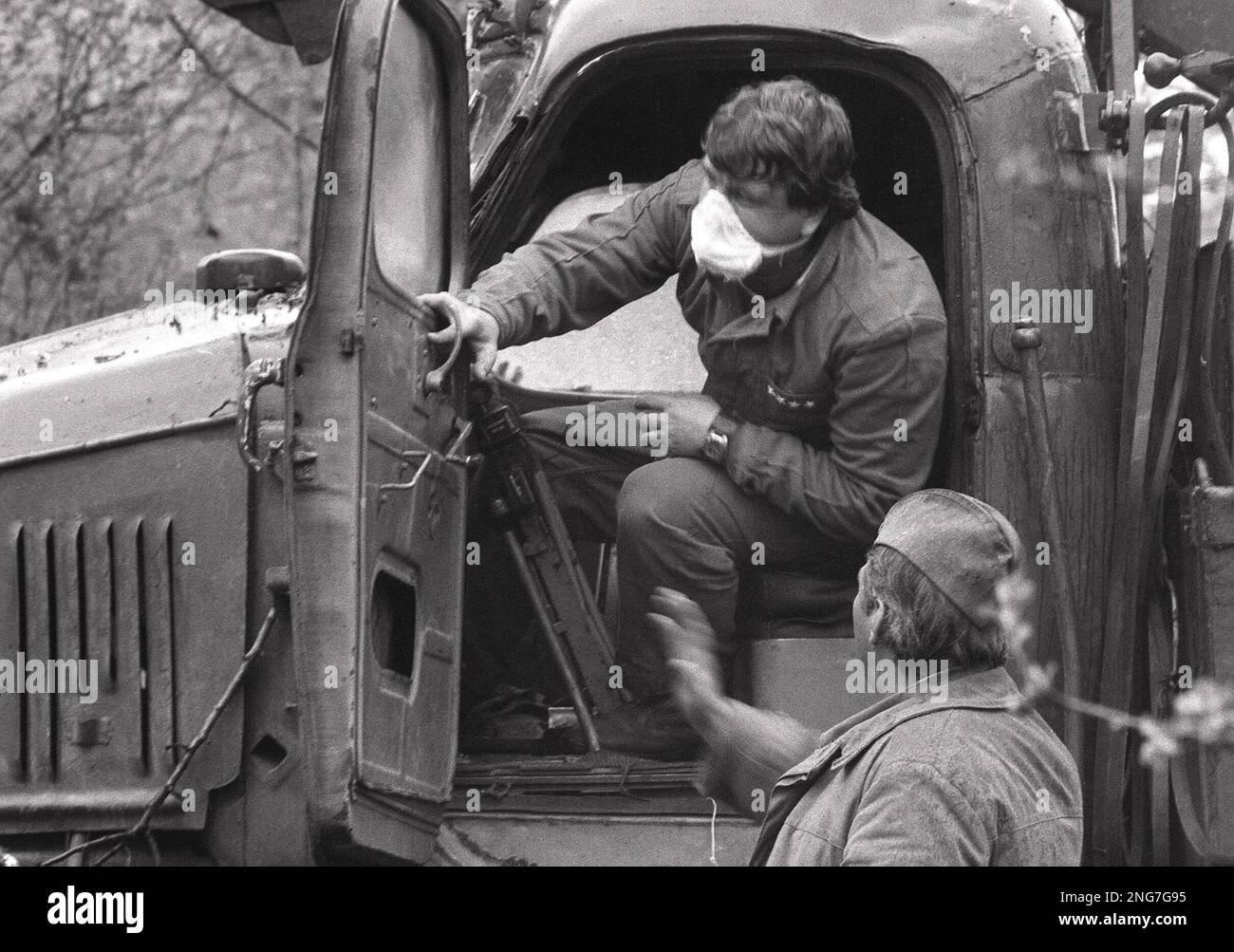 Military reservists are seen during a decontamination work near ...