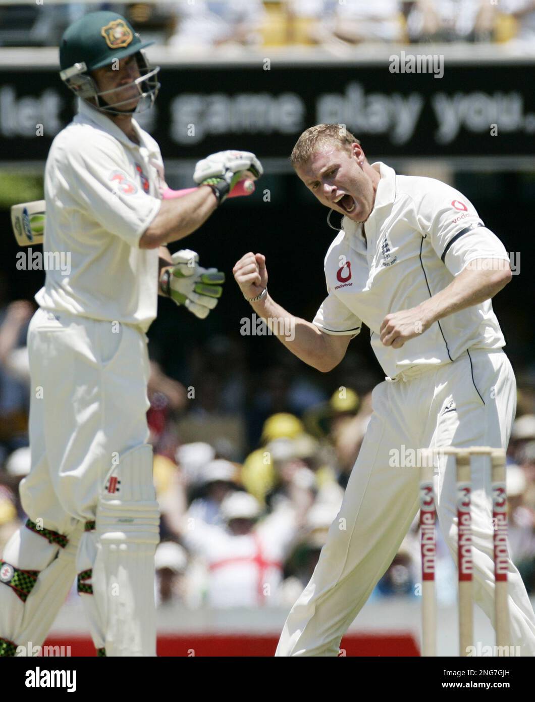 England captain Andrew Flintoff, right, celebrates after dismissing ...