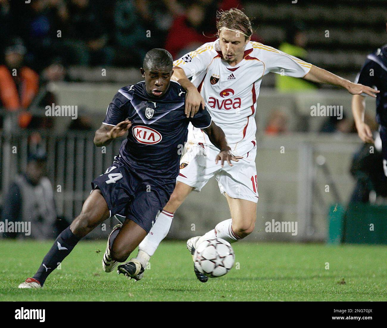 Bordeaux player Rio Antonio Mavuba, left, challenges for the ball with ...