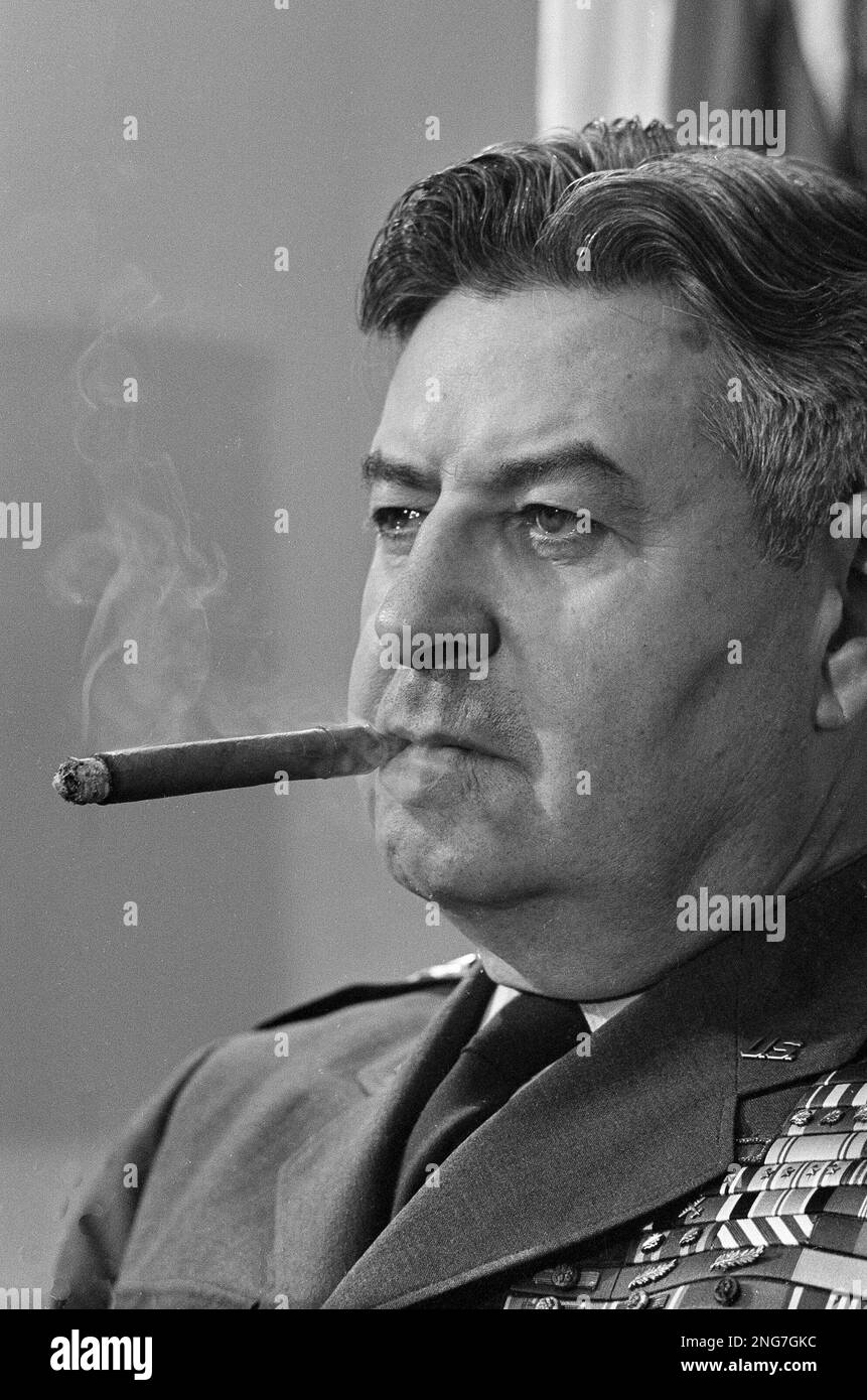 General Curtis Lemay poses in uniform and with cigar, January 30, 1965 ...
