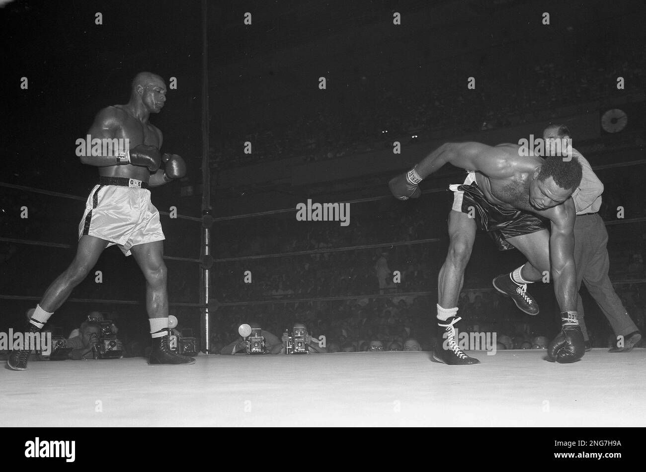 American world light heavyweight champion Archie Moore retains his ...