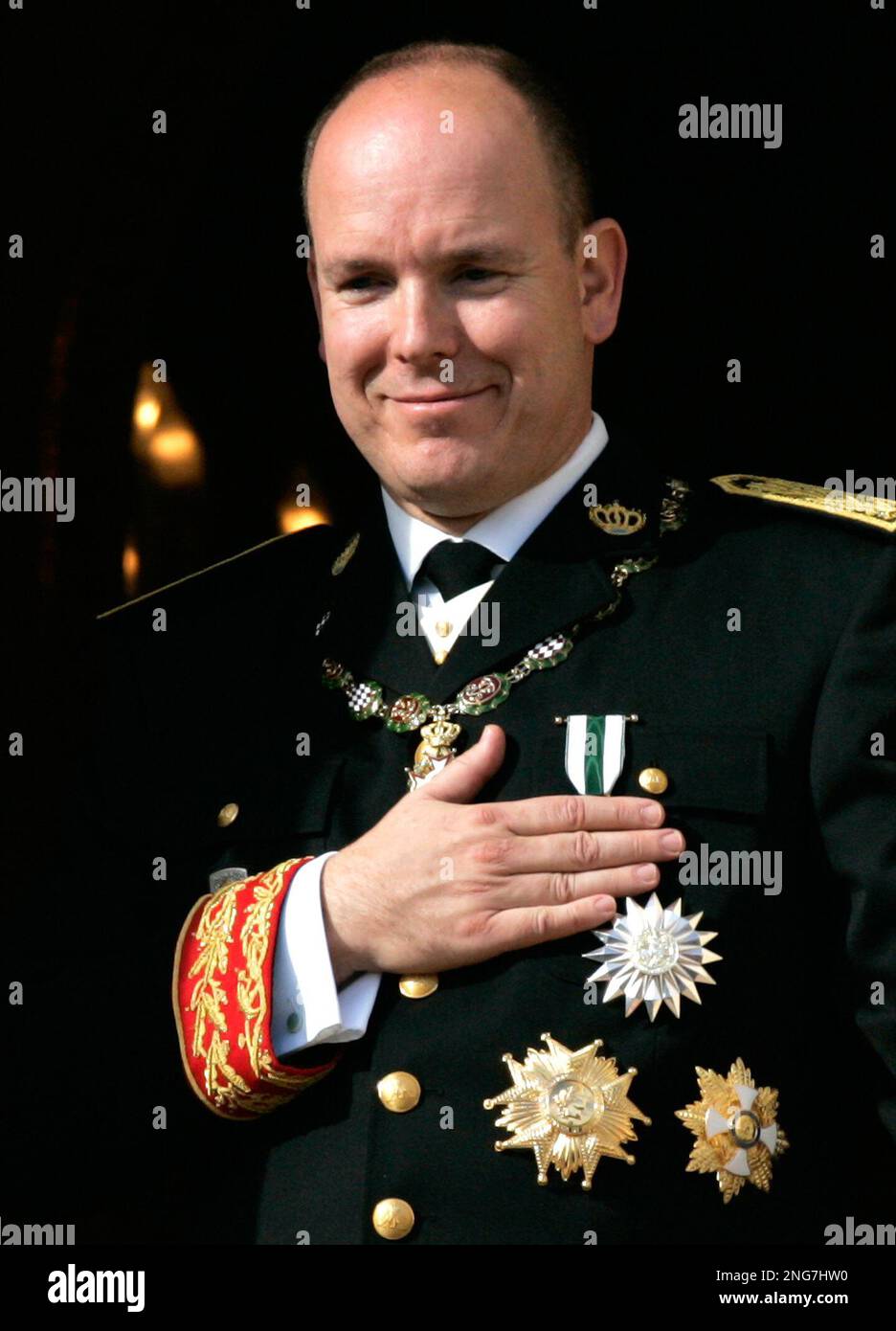 Prince Albert II of Monaco gestures from the Monaco palace during ...
