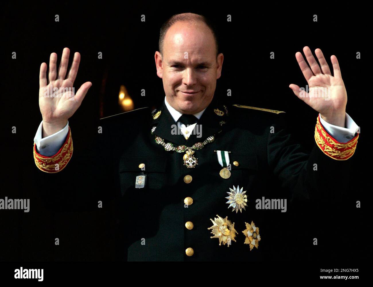 Prince Albert II of Monaco waves from the Monaco palace during Monaco's ...