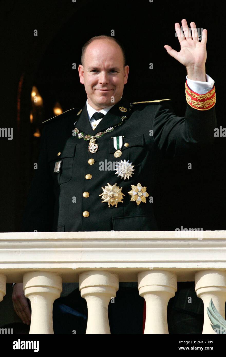Prince Albert II of Monaco waves from the Monaco palace during Monaco's ...