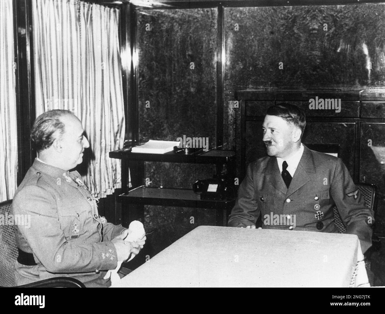 German Chancellor Adolf Hitler, right, talks with Spain's Generalissimo ...