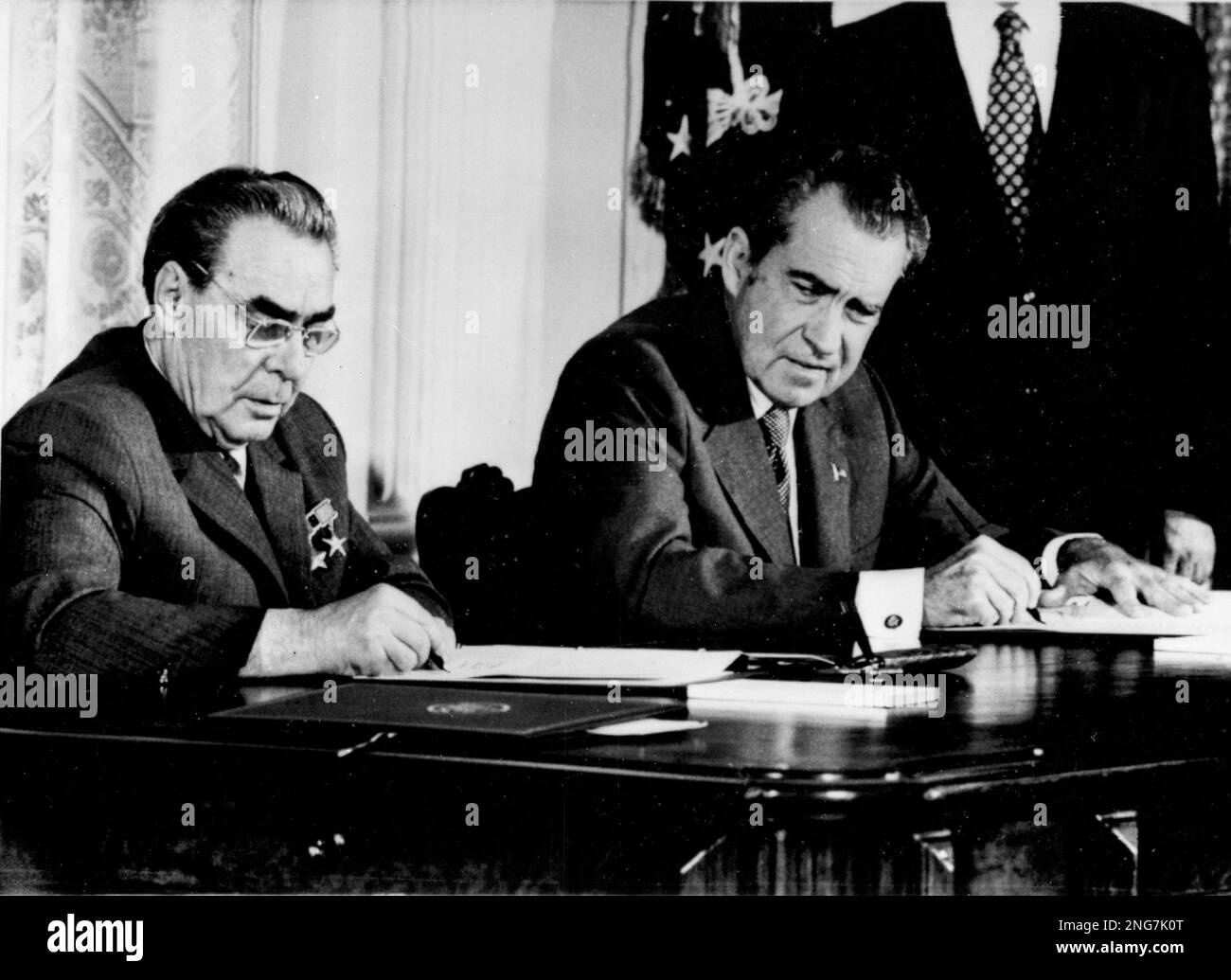 President Richard Nixon, right, and Soviet leader Leonid Brezhnev affix ...