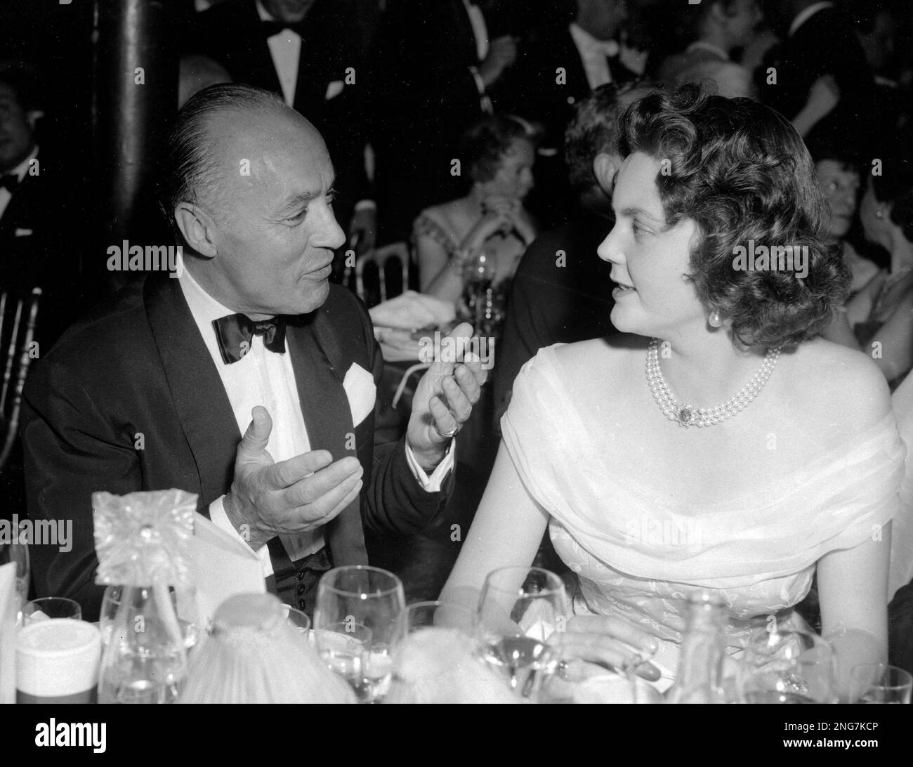 French actor Charles Boyer talks to Princess Maria Pia of Savoy, wife ...