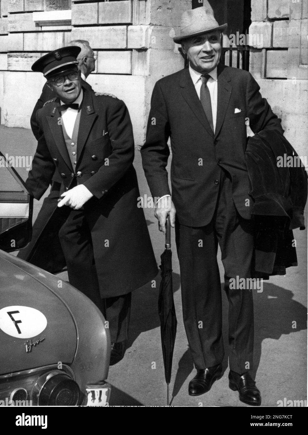 French actor Charles Boyer, right, is seen infront of the Hotel Crillon ...