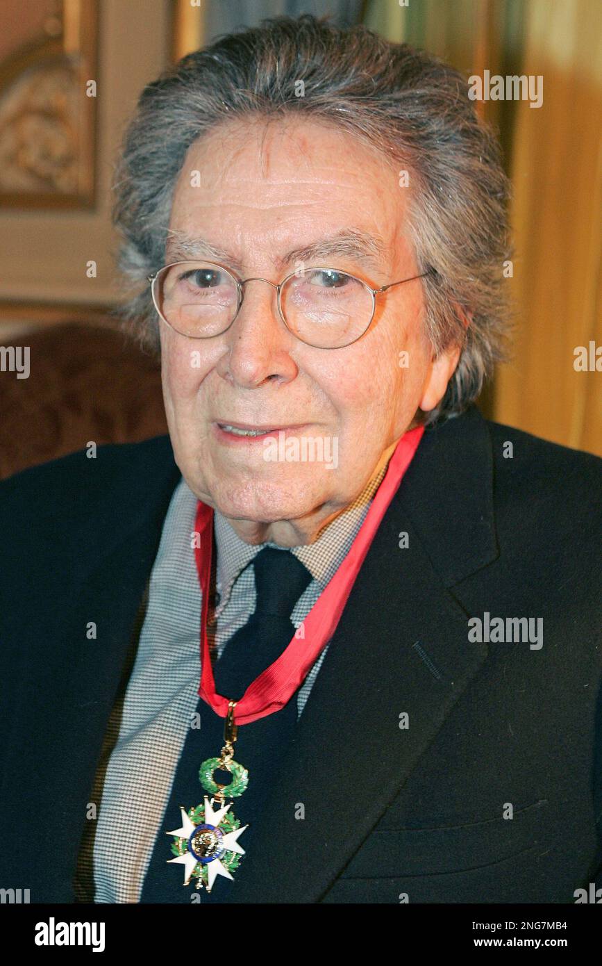 Spanish painter Antoni Tapies smiles after he was awarded the Commander ...