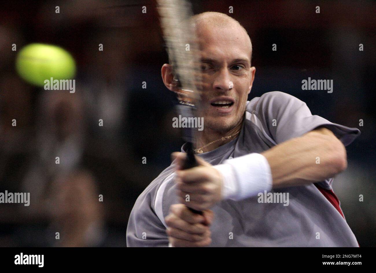 Nikolay Davydenko of Russia returns to Dominik Hrbaty of Slovakia ...