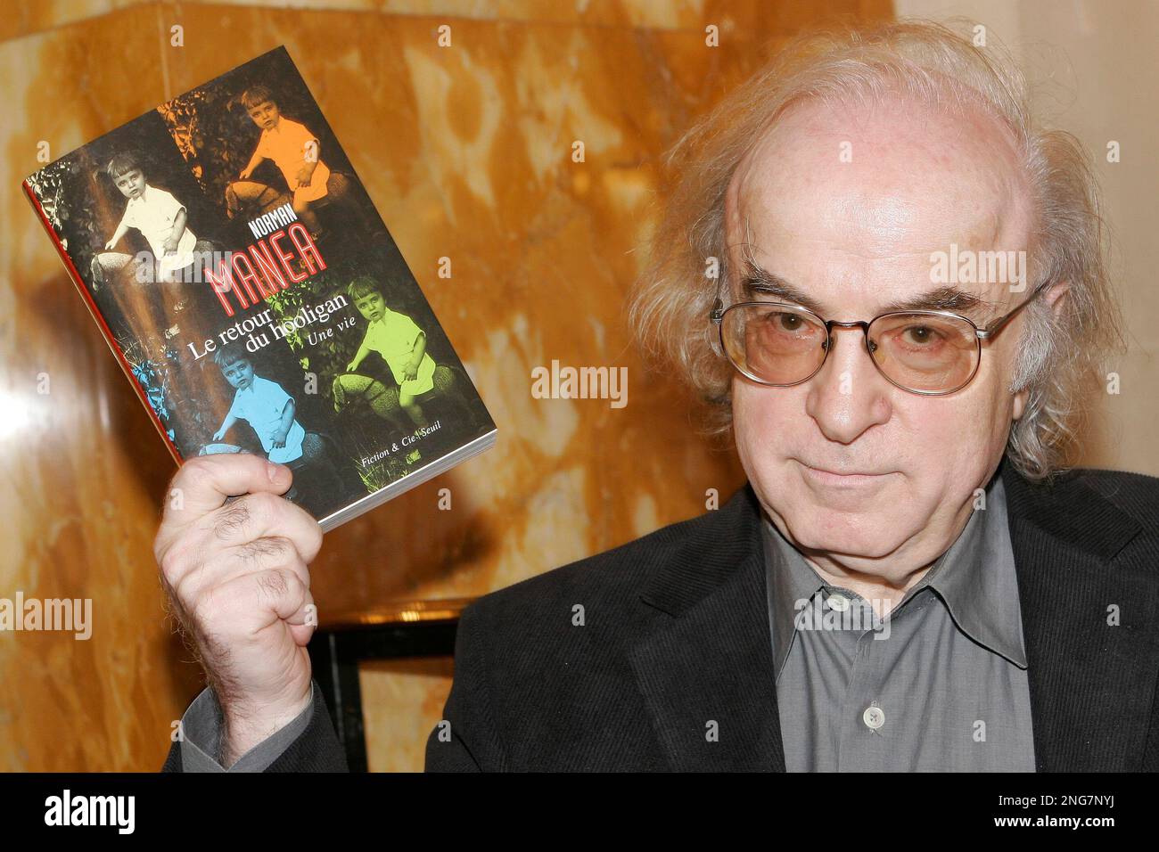 Romanian writer Norman Manea poses at the Hotel Crillon with his novel ...