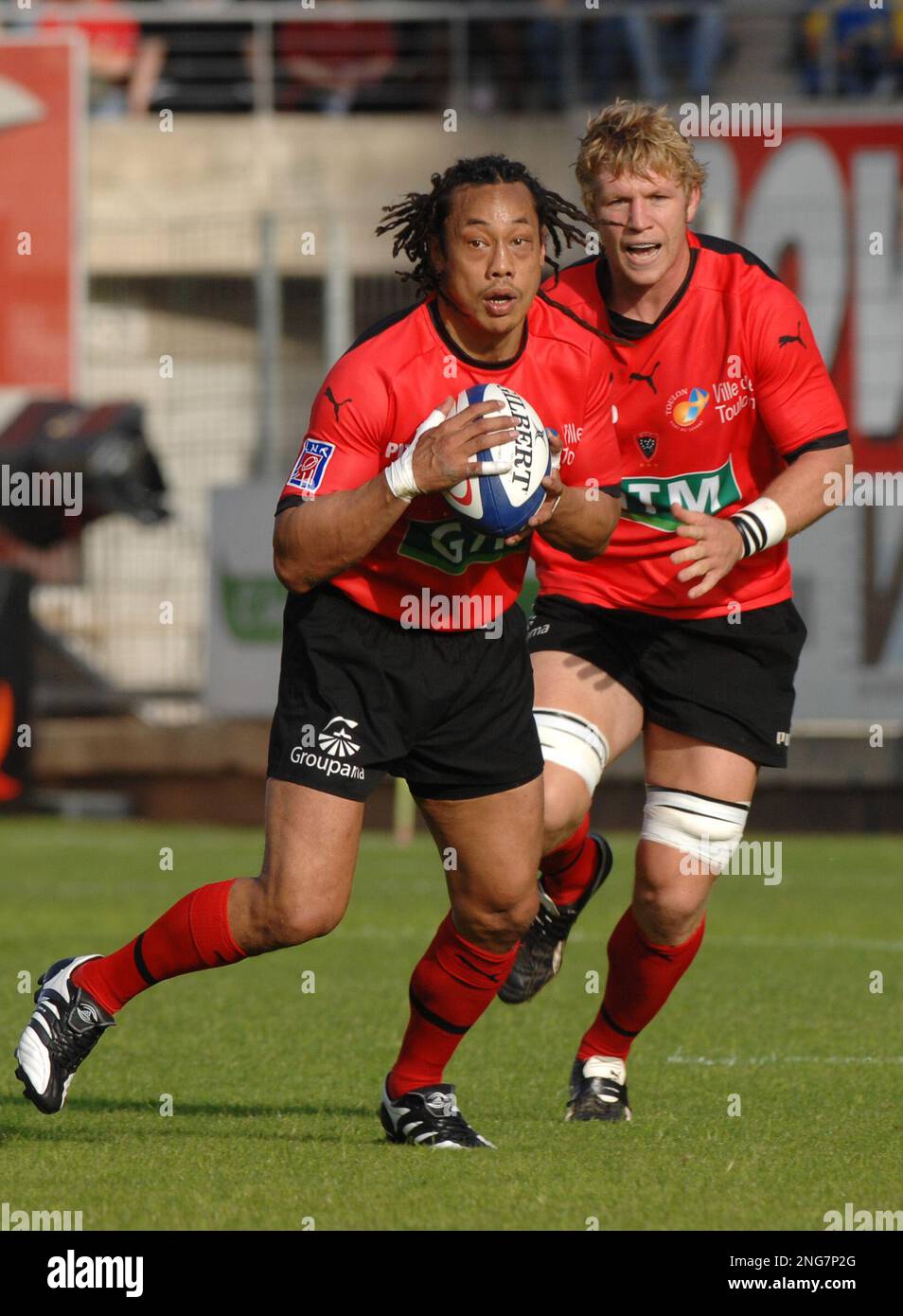 New Zealand rugby player Tana Umaga, left, former captain and center of ...