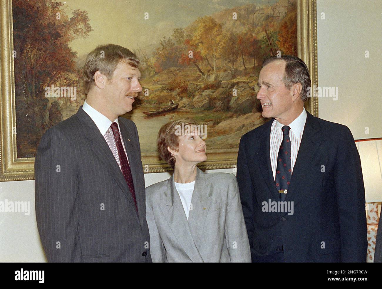 Vice President George Bush meets with the pilot Robert Schornstheimer, left, and his co-pilot ...