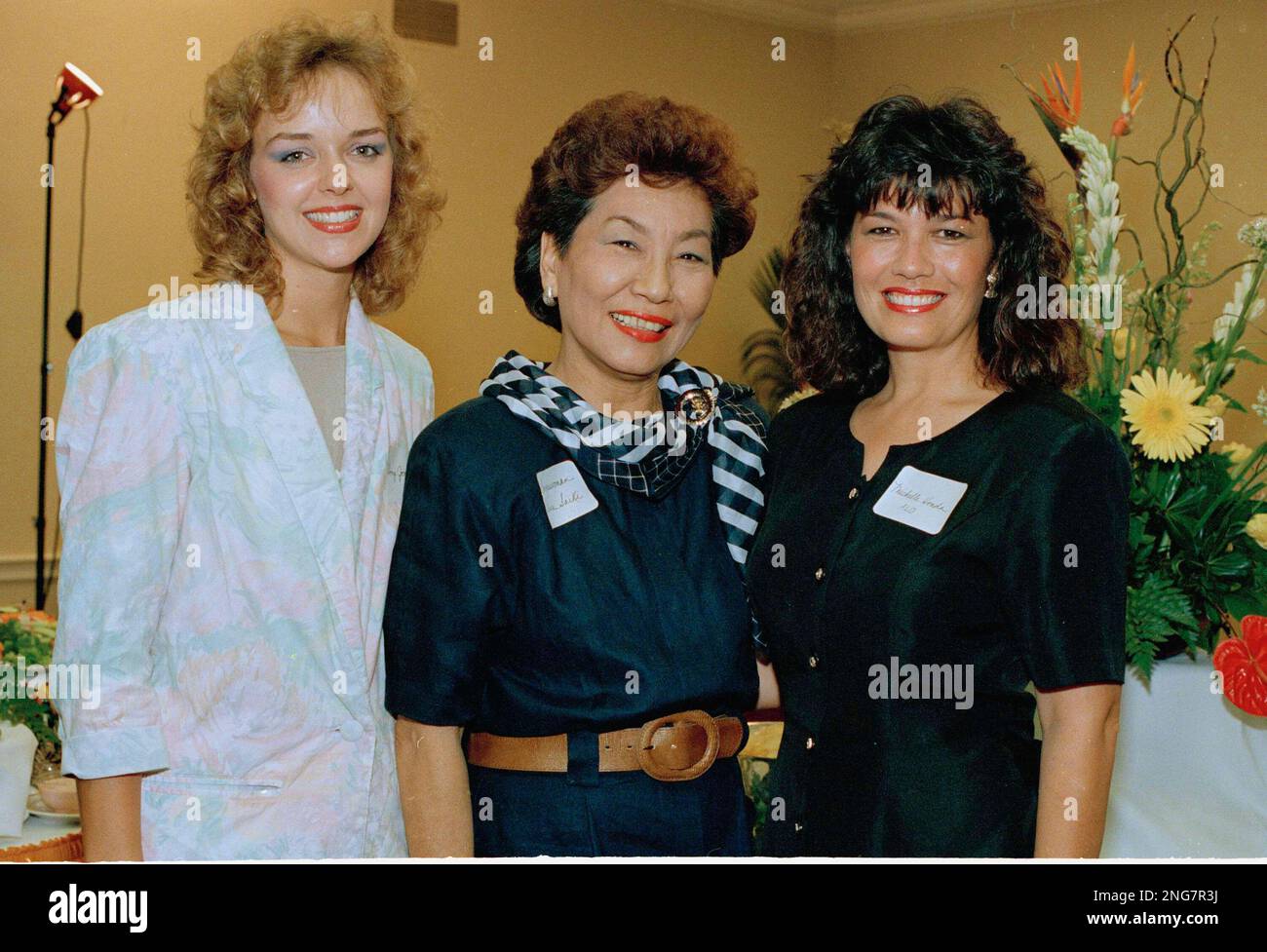 Rep. Patricia Saiki, R-Hawaii, is flanked by Aloha Airlines flight ...