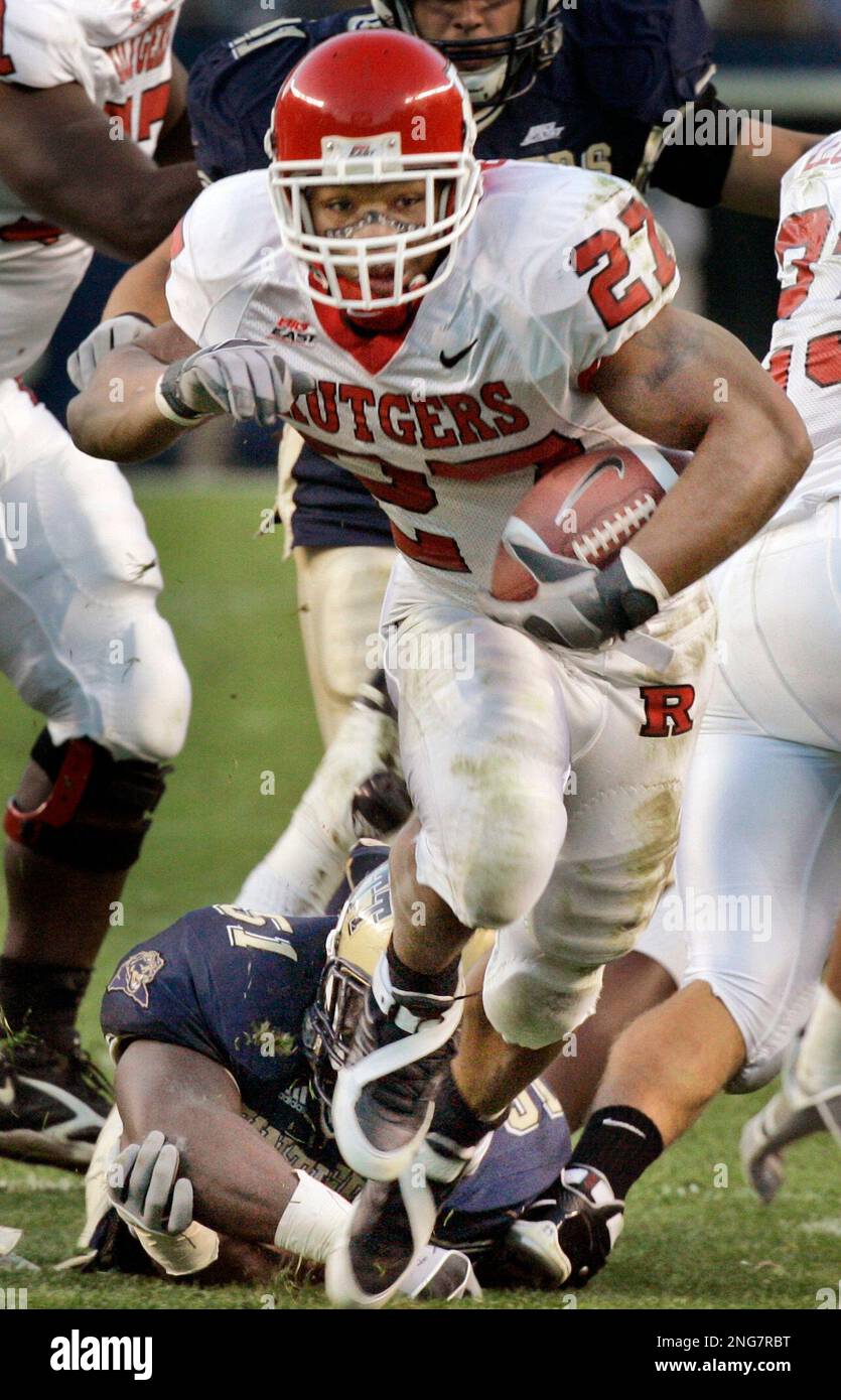Rutgers running back Ray Rice, top, busts a run over Pittsburgh ...