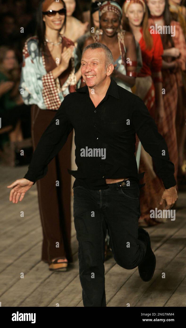 French fashion designer Jean Paul Gaultier acknowledges applause at the ...