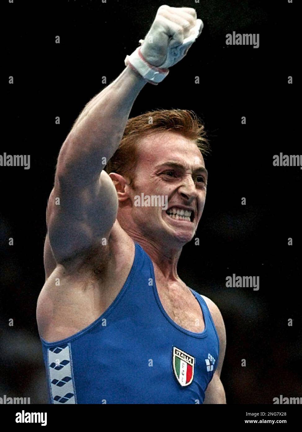 FILE--Italy's Yuri Chechi reacts after performing his routine in the ...
