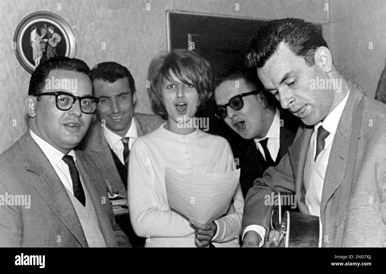 FILE- Italian pop singer Mina is shown with her group "Happy Boys" in this 1959 file photo. The ...