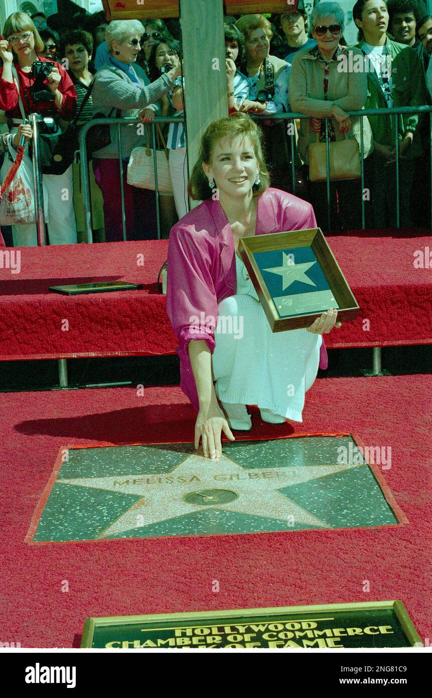 Actress Melissa Gilbert raises the cover off her star on the Hollywood ...