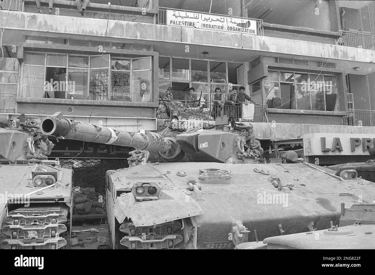 Israeli personnel pictured relaxing in the shade, on the porch of the ...