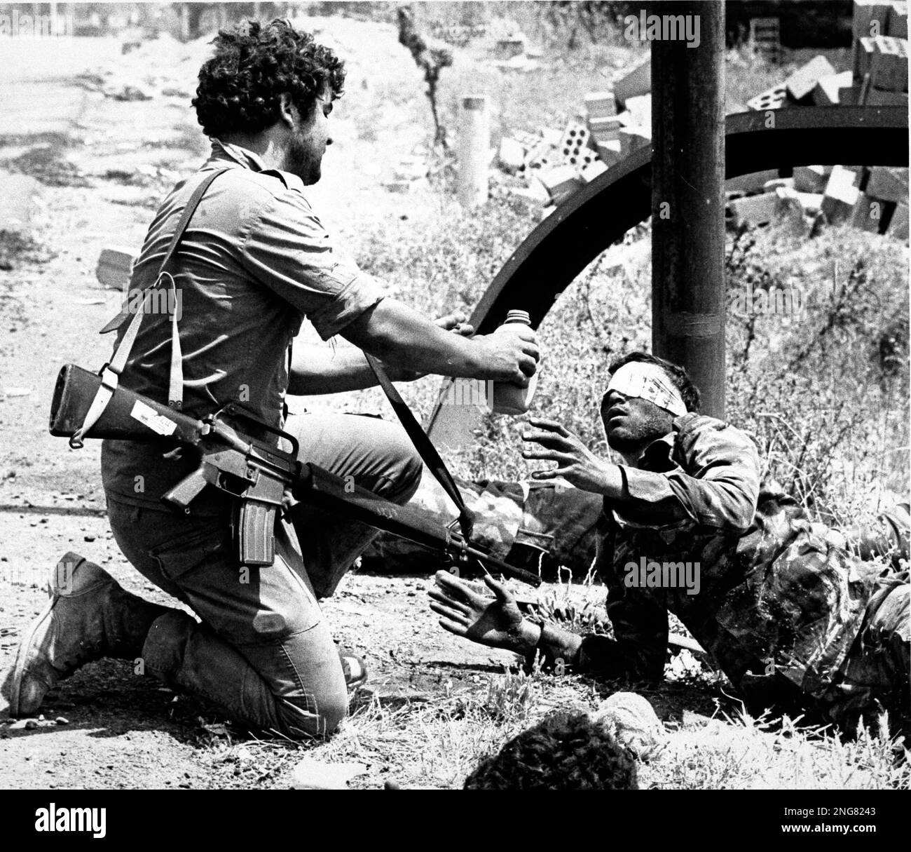 A blindfolded Syrian soldier captured by Israeli soldiers at the Beirut ...