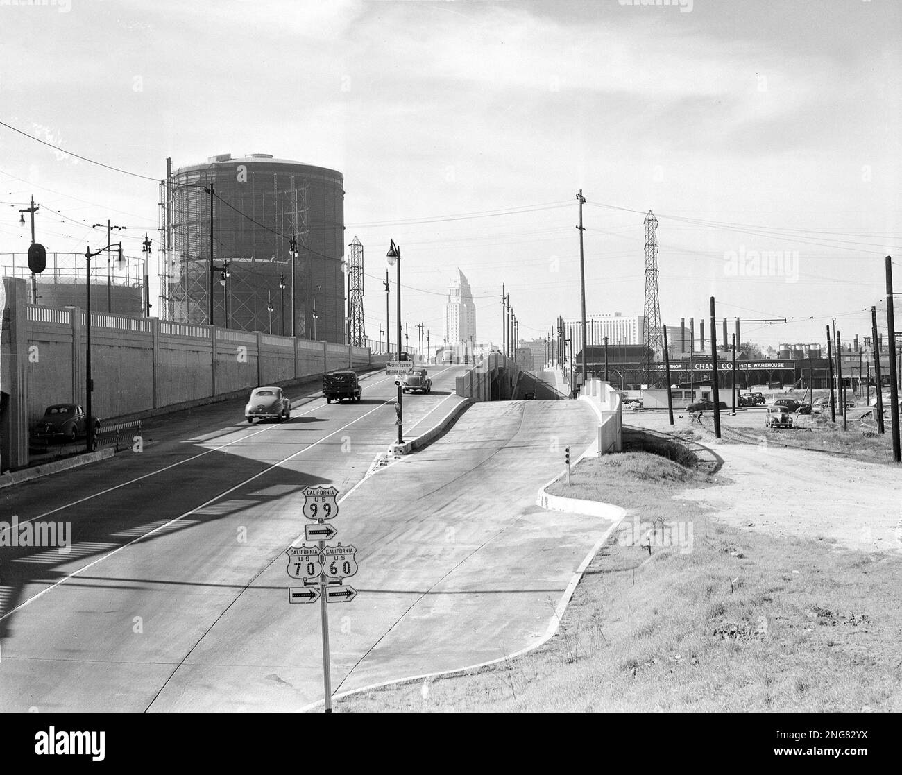 In this portrait of a city in early boom, motorists arrive from the ...