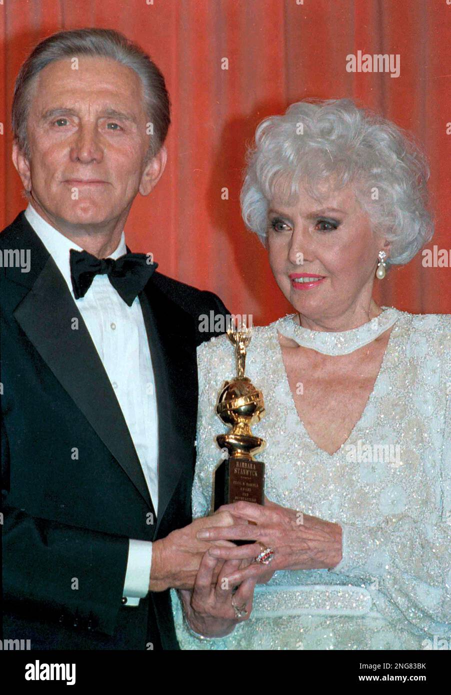 Actor Kirk Douglas and actress Barbara Stanwyck at the Golden Globe ...
