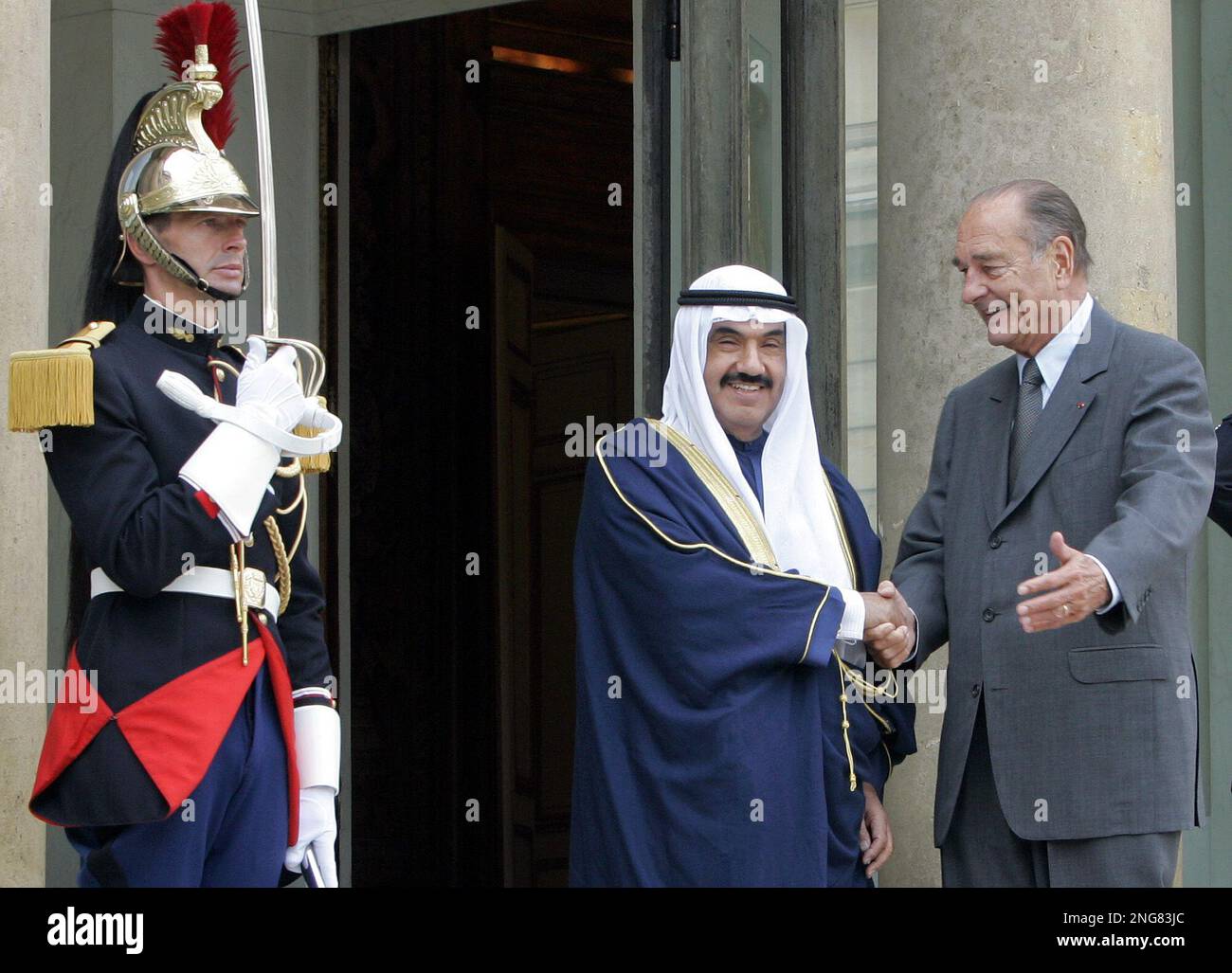 Kuwait's Prime Minister Sheik Nasser Al Mohammed Al Sabah, left, is ...