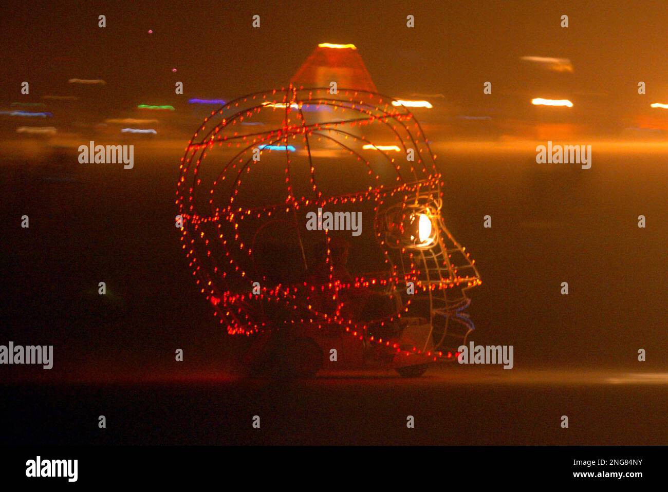 An art car rolls across the playa at the 20-year-old Burning Man art ...