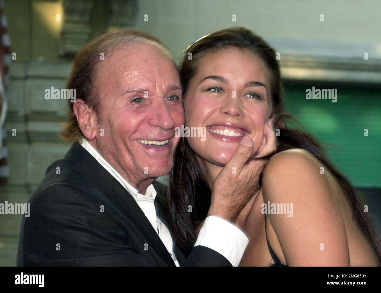 The contest organizer Enzo Mirigliani, left and Australian top-model ...