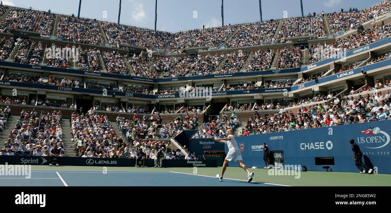 Andre Agassi in action action against Benjamin Becker at the US Open ...