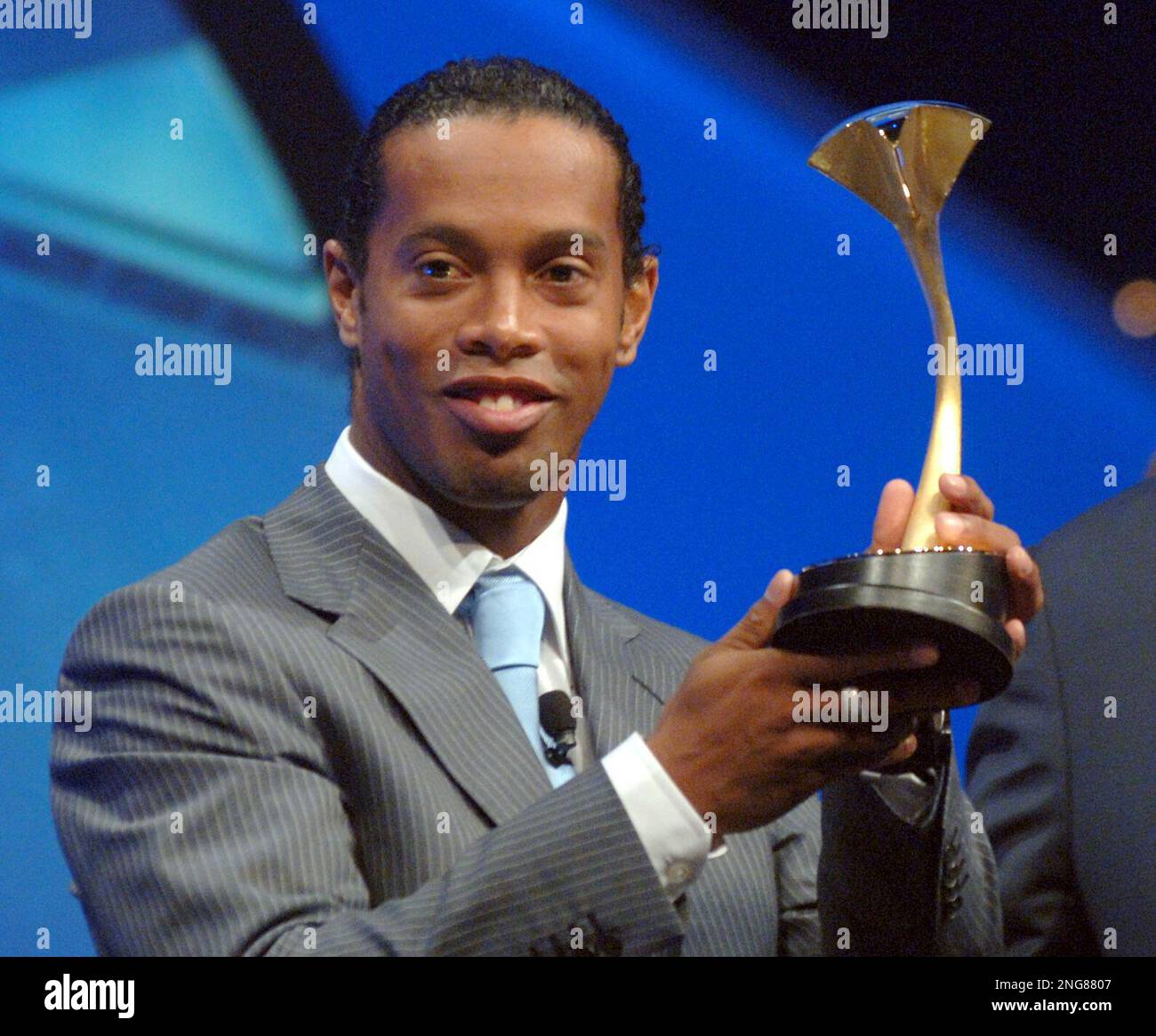 FC Barcelona's Brazilian player Ronaldinho receives the best player of ...