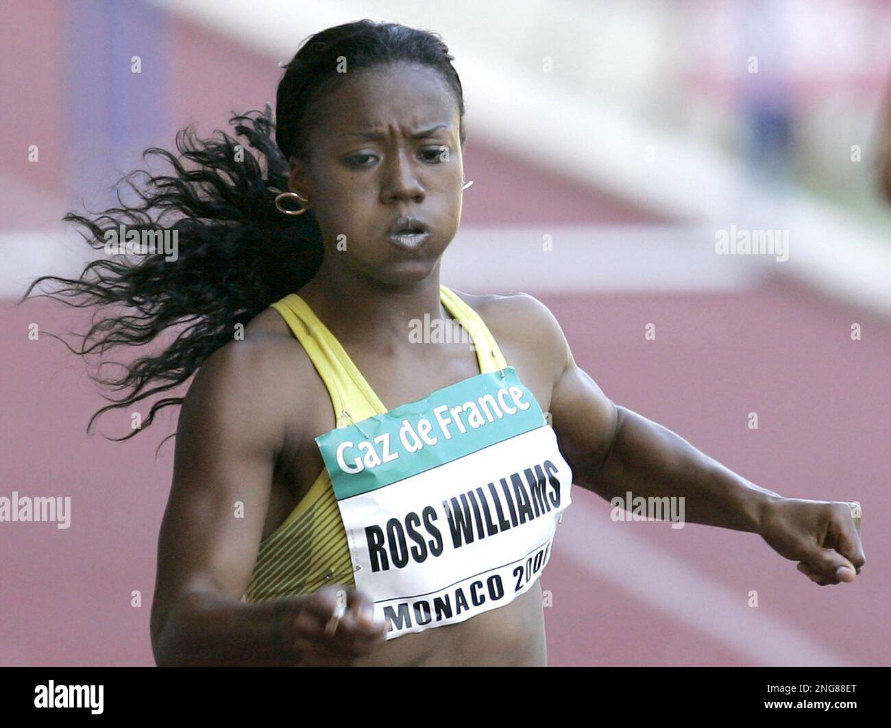 Tiffany Ross-Williams of the US crosses the finish line to win the ...