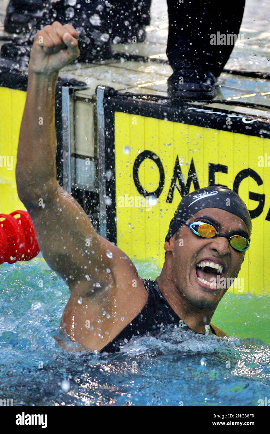 India's Varun Divgikar exults after winning gold in the 50 meters ...