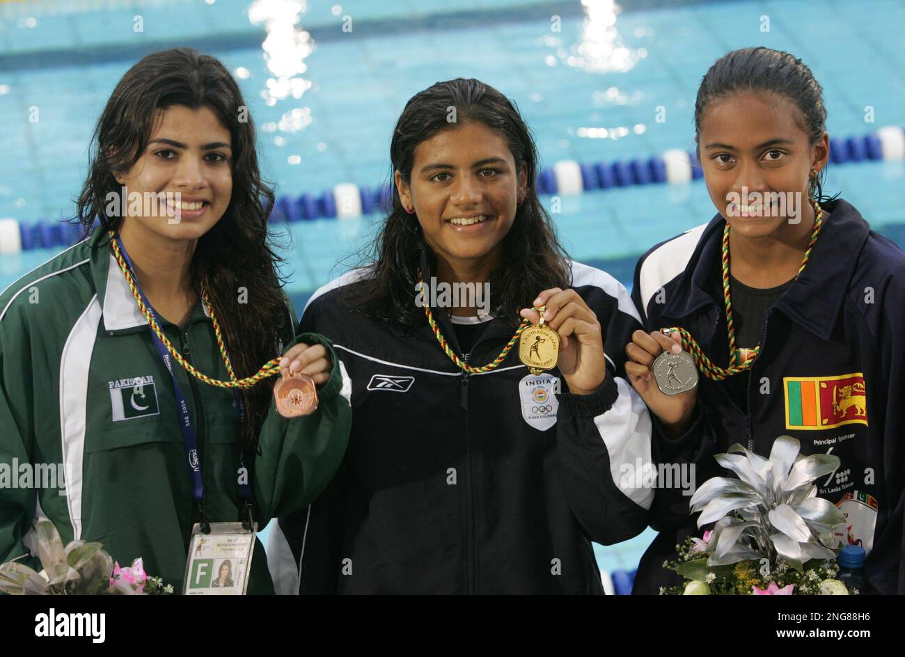 Gold winner India's Lekha Kamath, center, silver winner Sri Lanka's ...