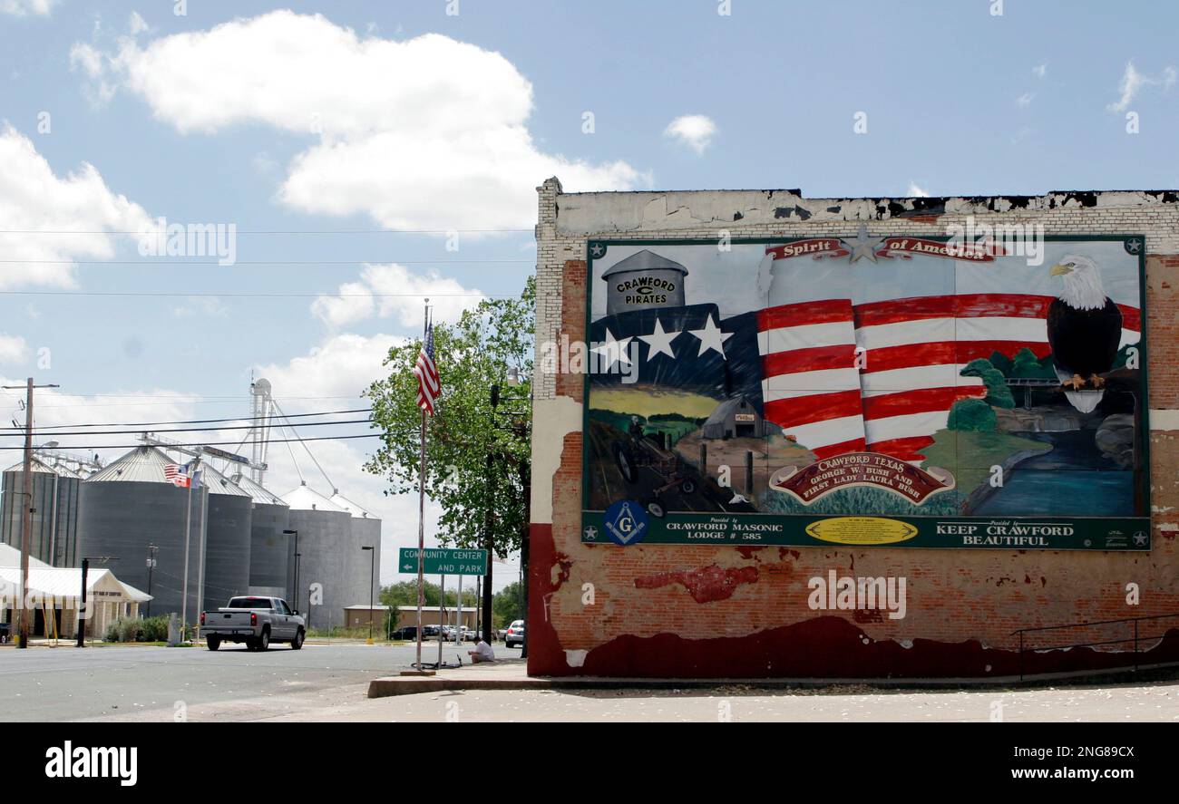 A mural on the side of a building in Crawford, Texas, Sunday, Aug. 13 ...