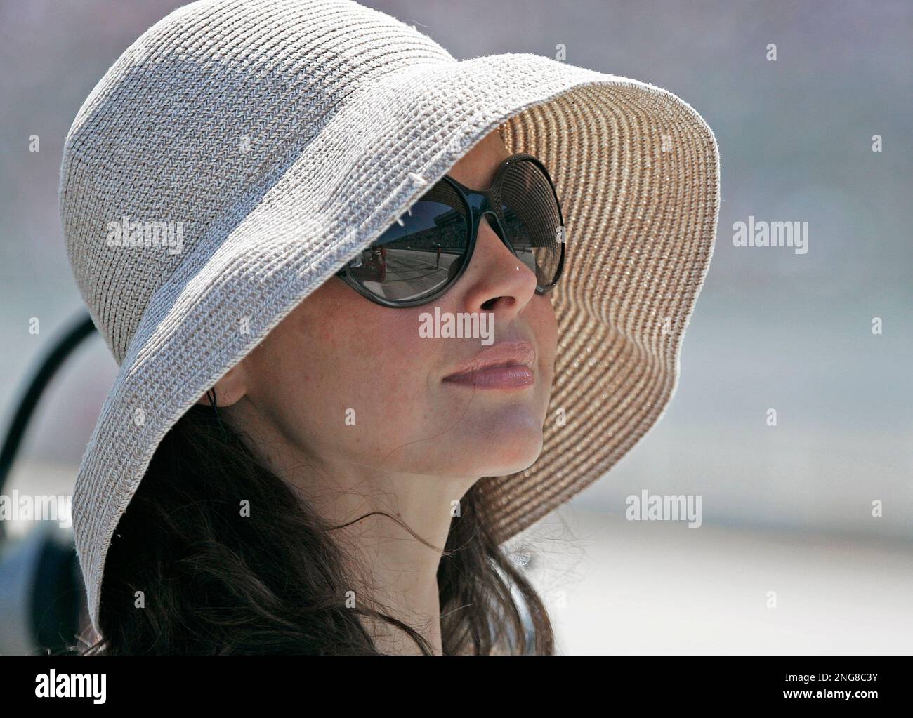 Actress Ashley Judd watches her husband Dario Franchitti drive past the ...