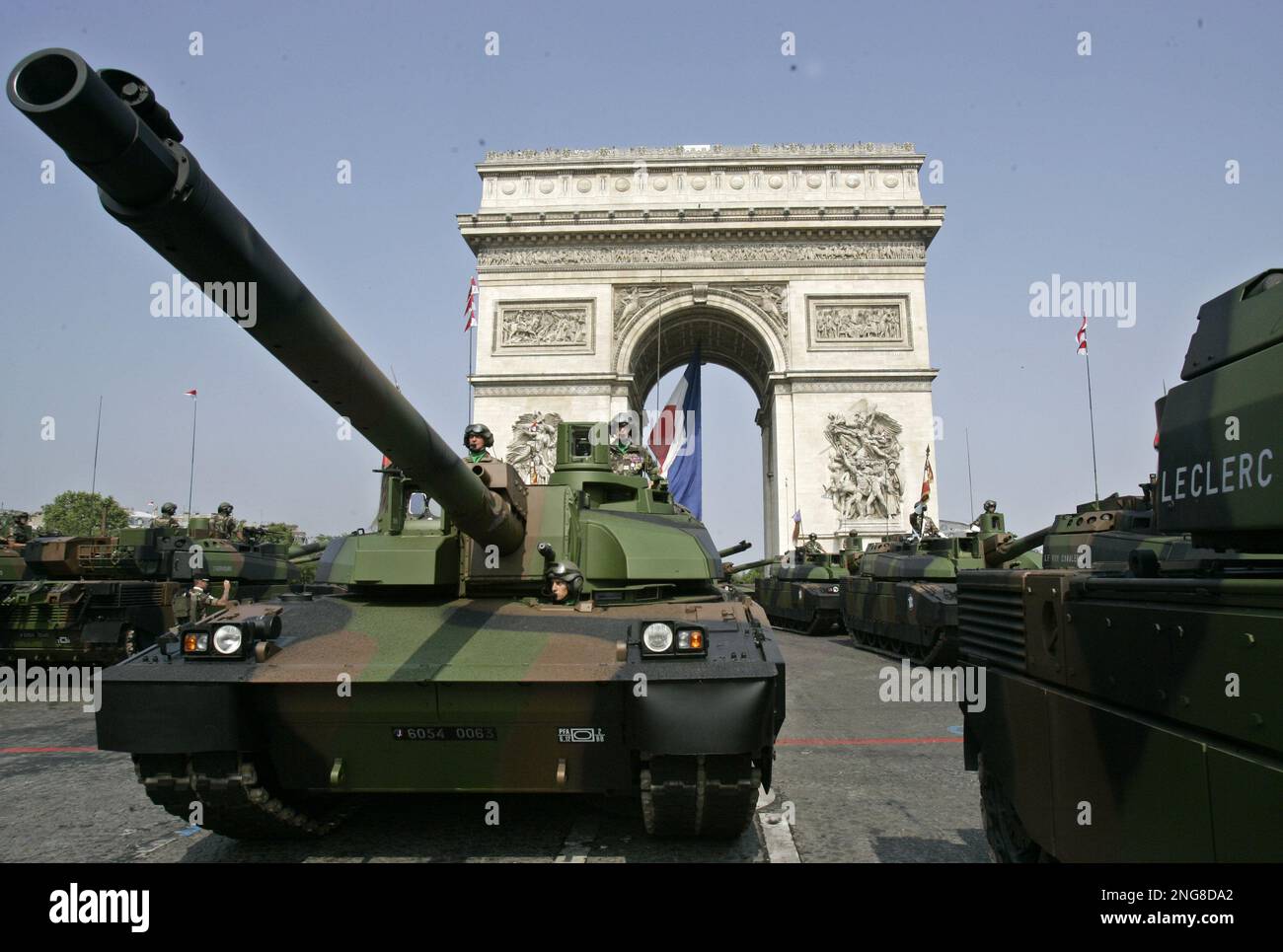 "Leclerc" tanks drive down the Champs Elysees avenue during the ...