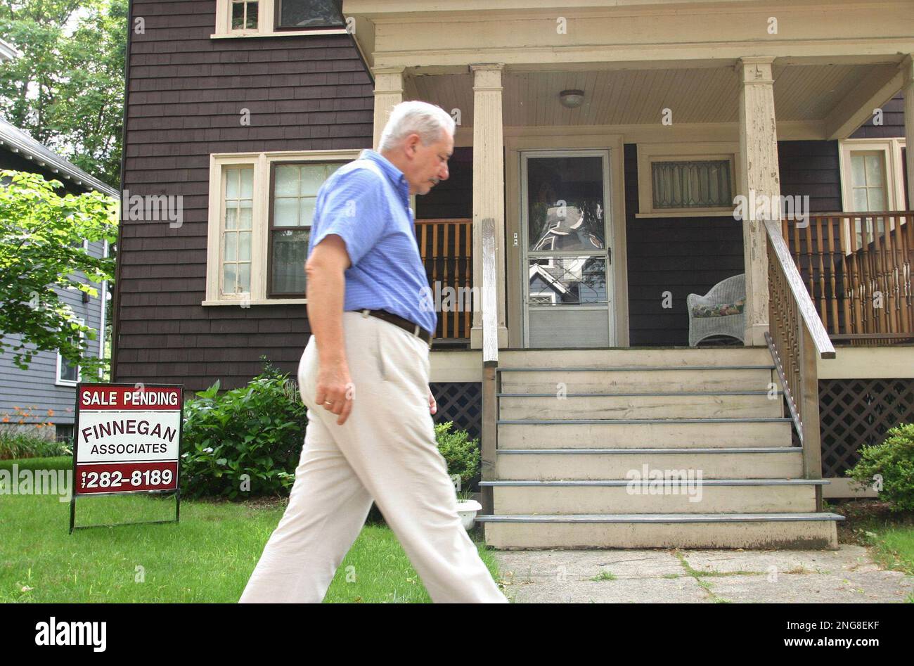 **FOR CAROLYN CHAPPO** John Rigas walks toward the steps of the house ...