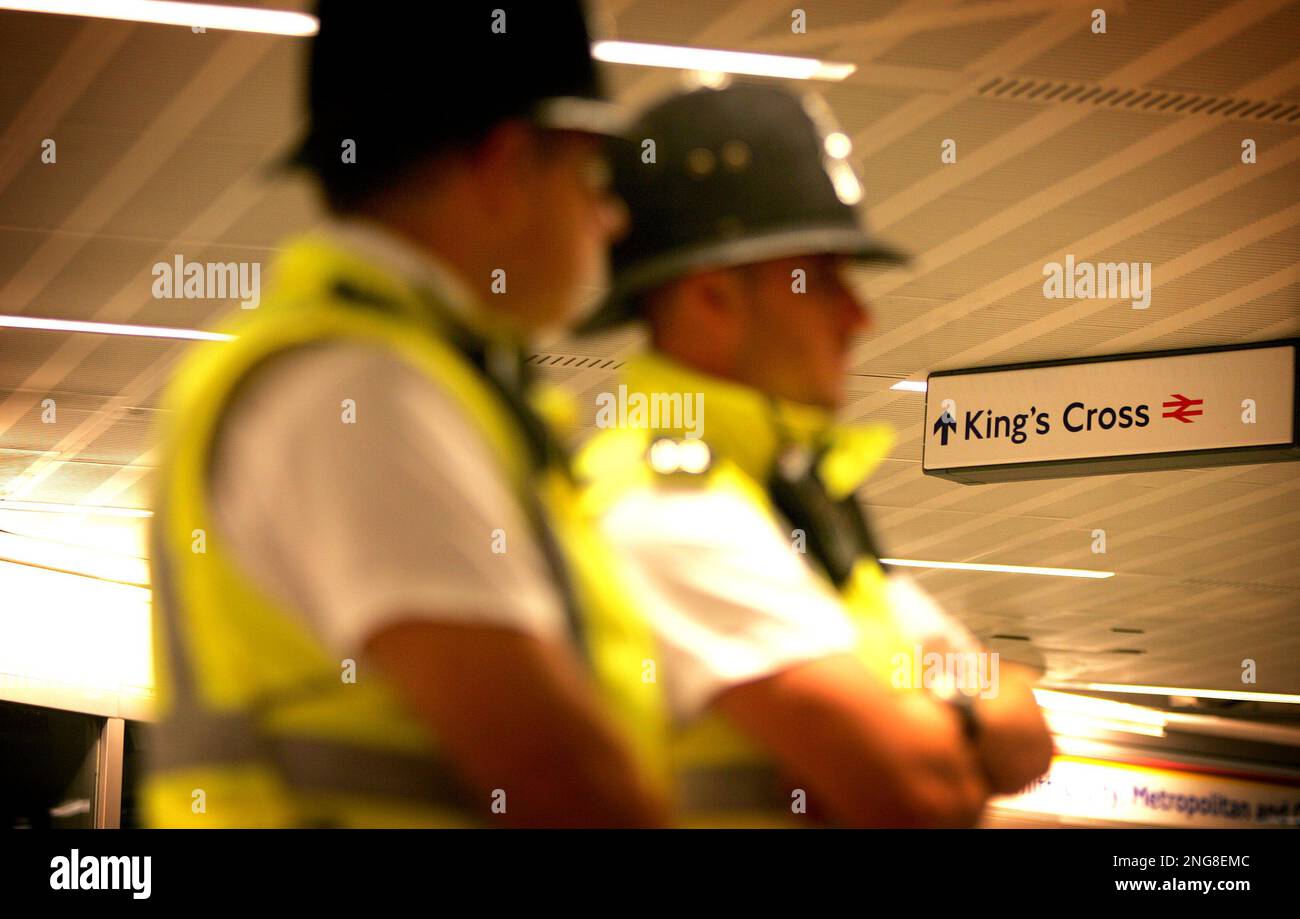 Police officers on duty at the underground station at Kings Cross on ...